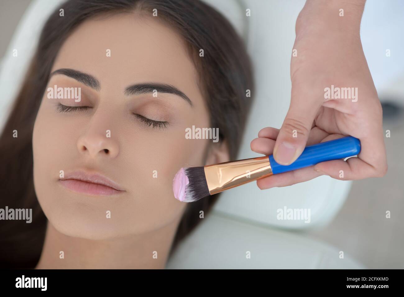 Careful cosmetologist hi-res stock photography and images - Alamy