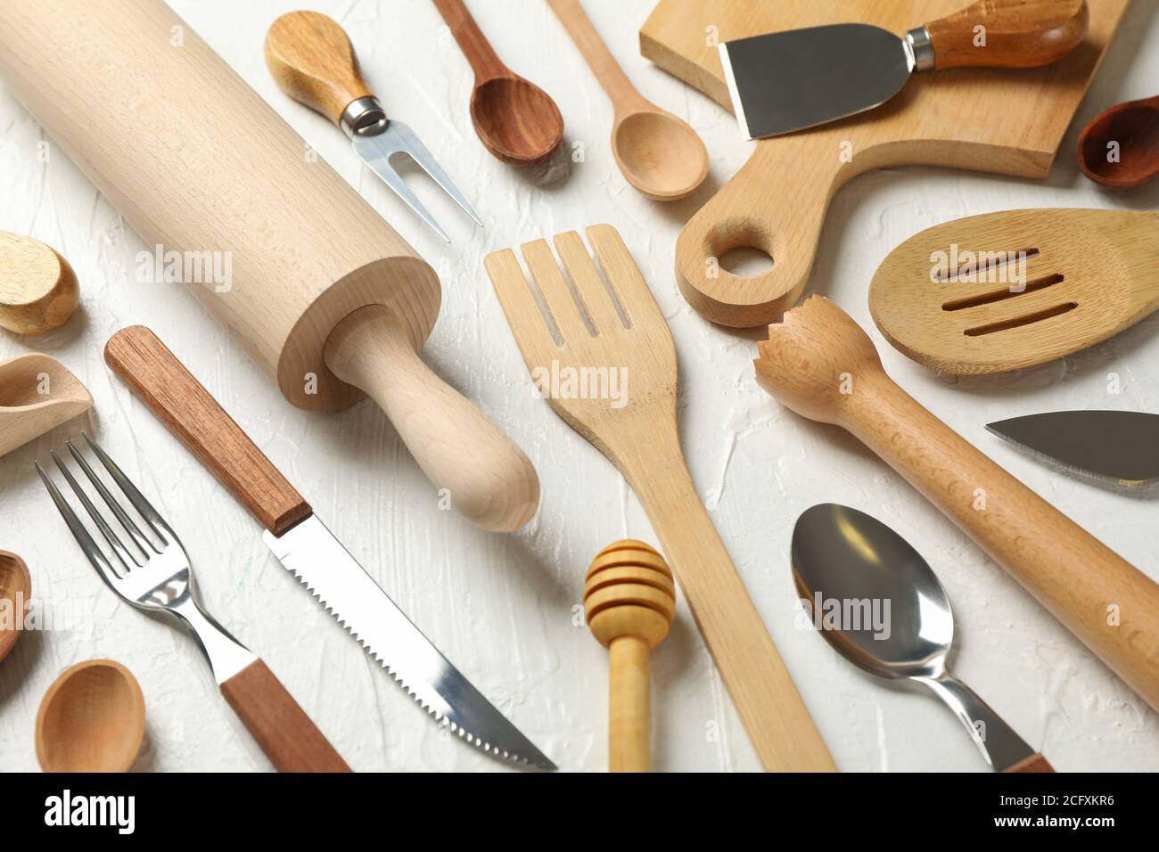 Composition with different kitchen cutlery on white background Stock ...