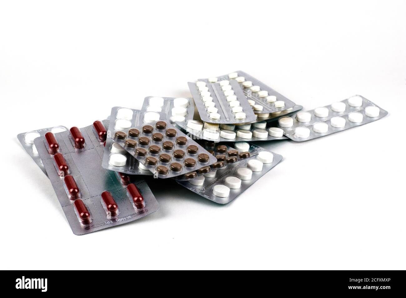 big pile of different pills in blisters on a white background Stock ...