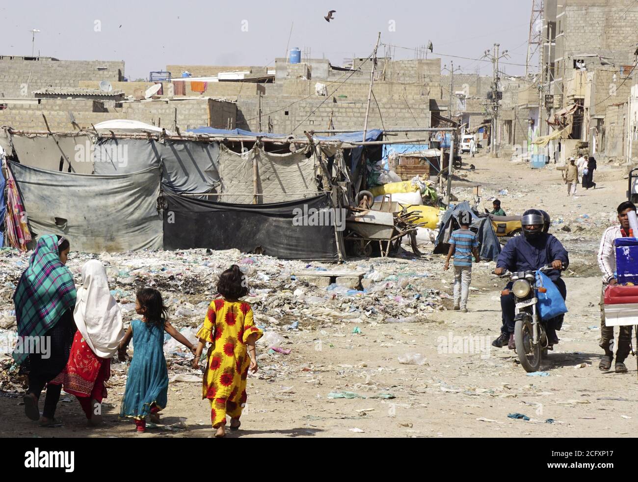 Photo taken Feb. 25, 2020, shows a slum area in Karachi, southern ...