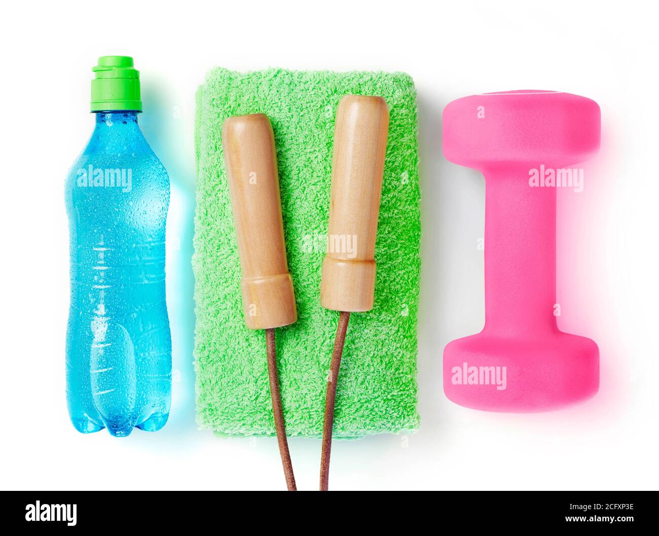 Water bottle, apple, jump rope,towel and dumbbell isolated on white ...