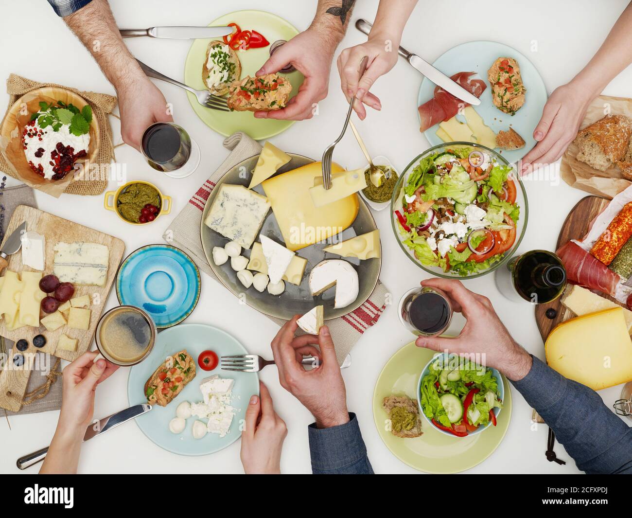 View from above the table of people eating Stock Photo - Alamy