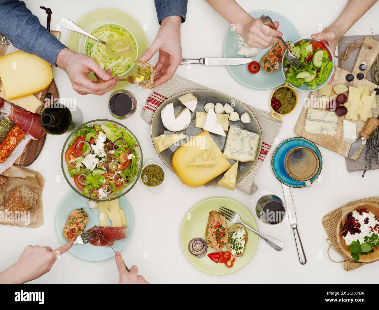 View from above the table of people eating Stock Photo - Alamy