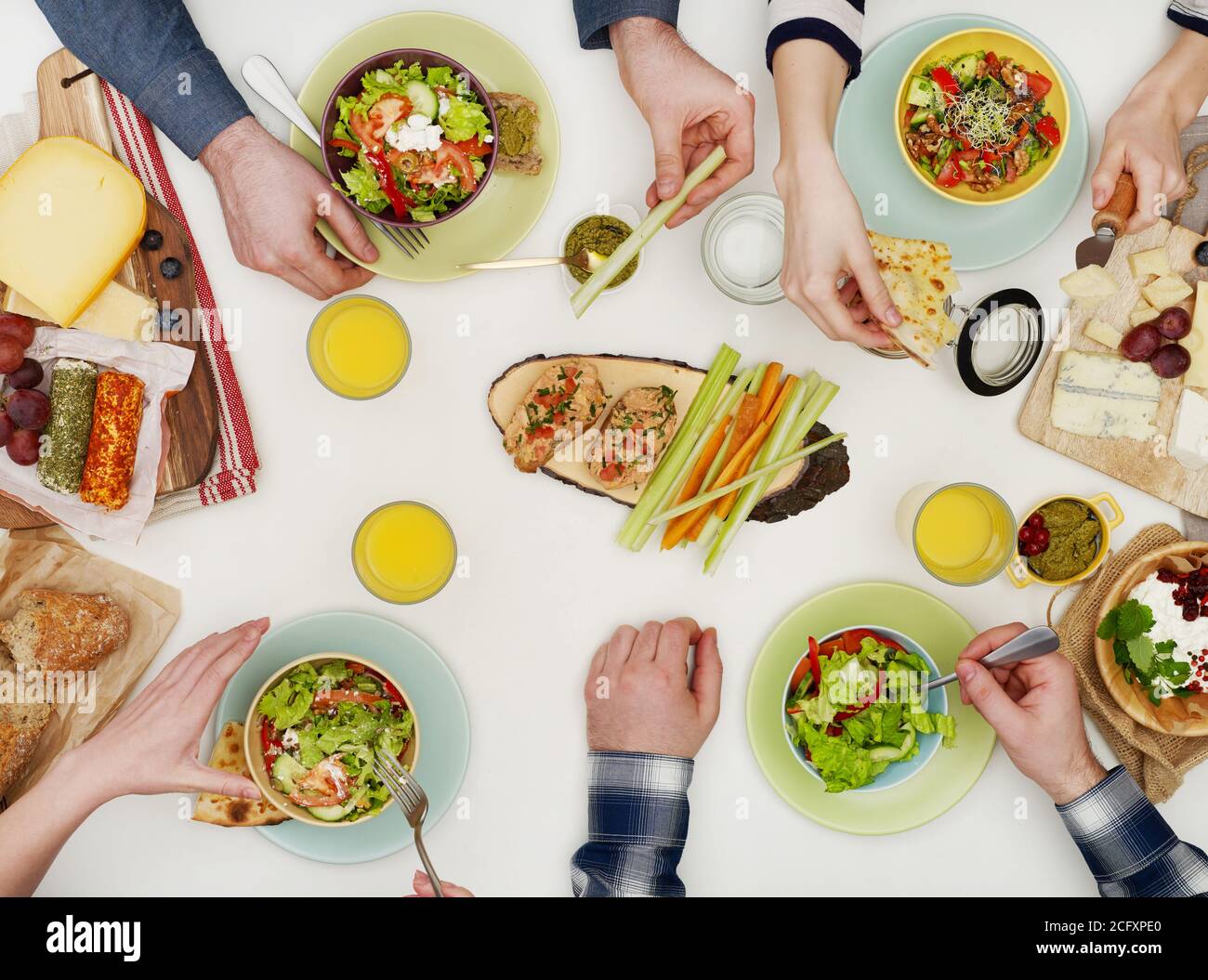 View from above the table of people eating Stock Photo - Alamy
