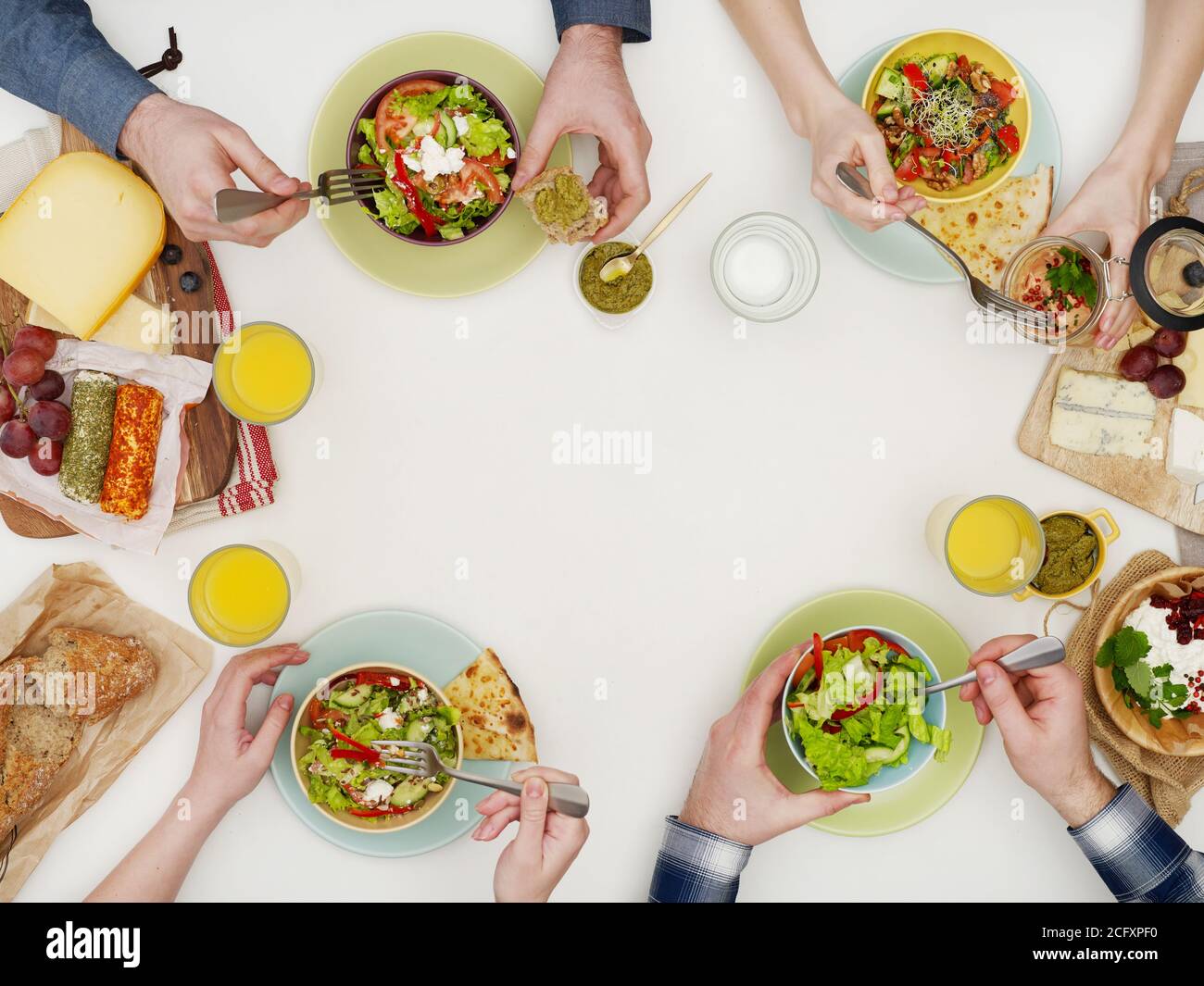 View from above the table of people eating Stock Photo - Alamy