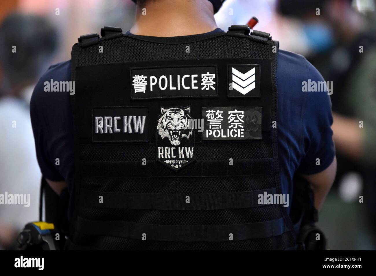 Hong kong police officer hi-res stock photography and images - Alamy