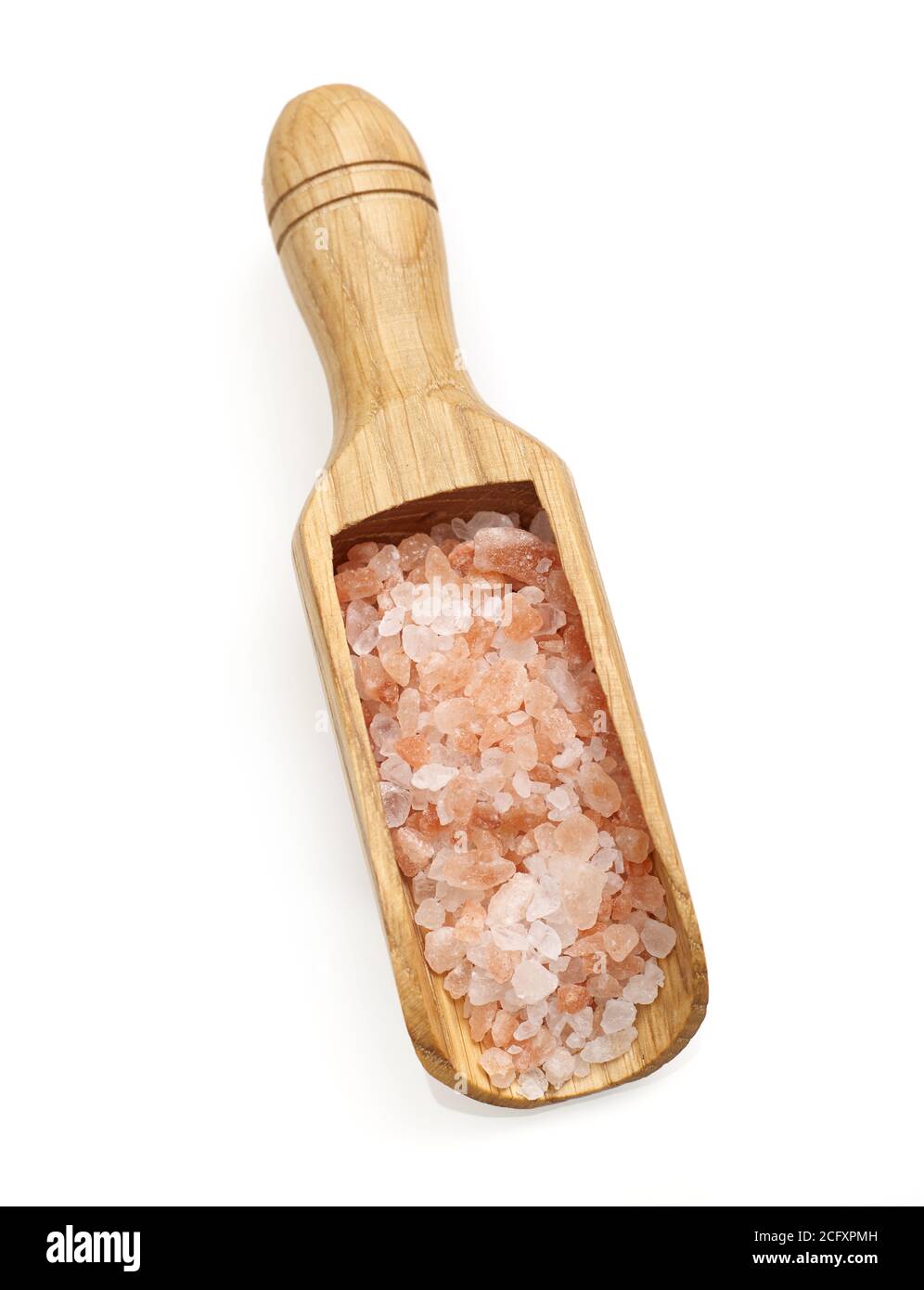Himalayan salt scoop isolated on white Stock Photo - Alamy