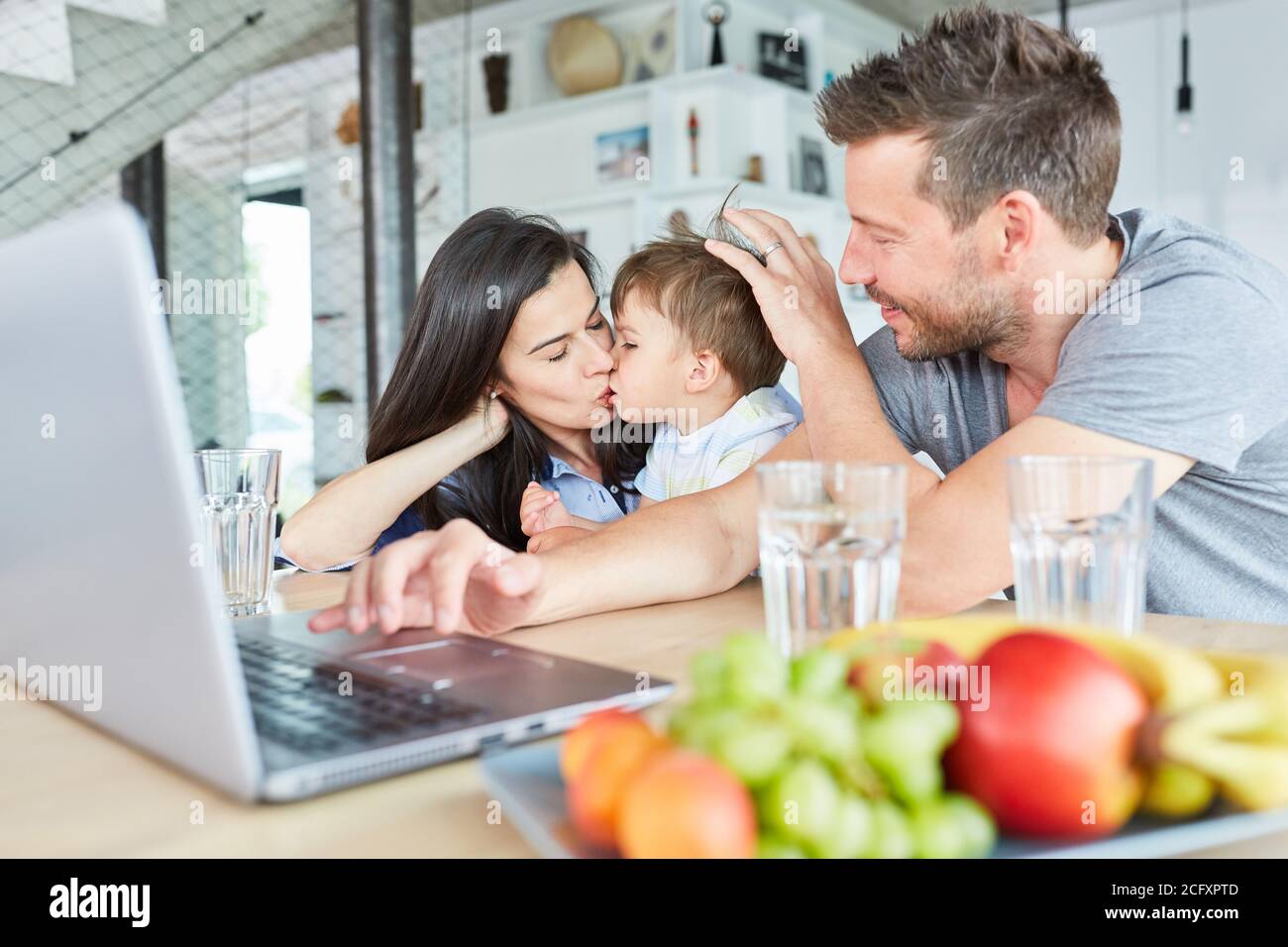 Woman kiss laptop hi-res stock photography and images - Alamy