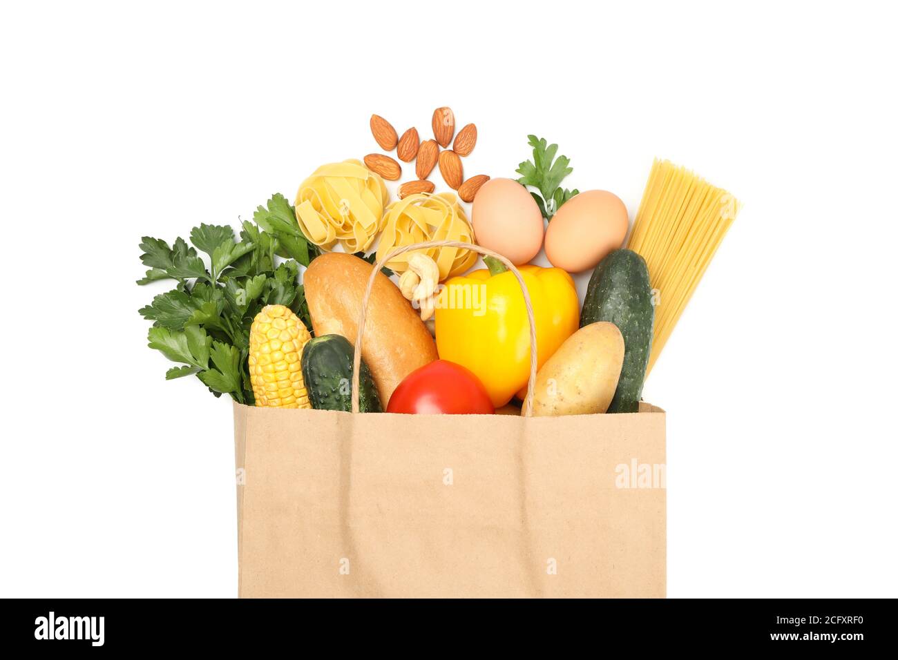 Paper bag with different food isolated on white background Stock Photo ...
