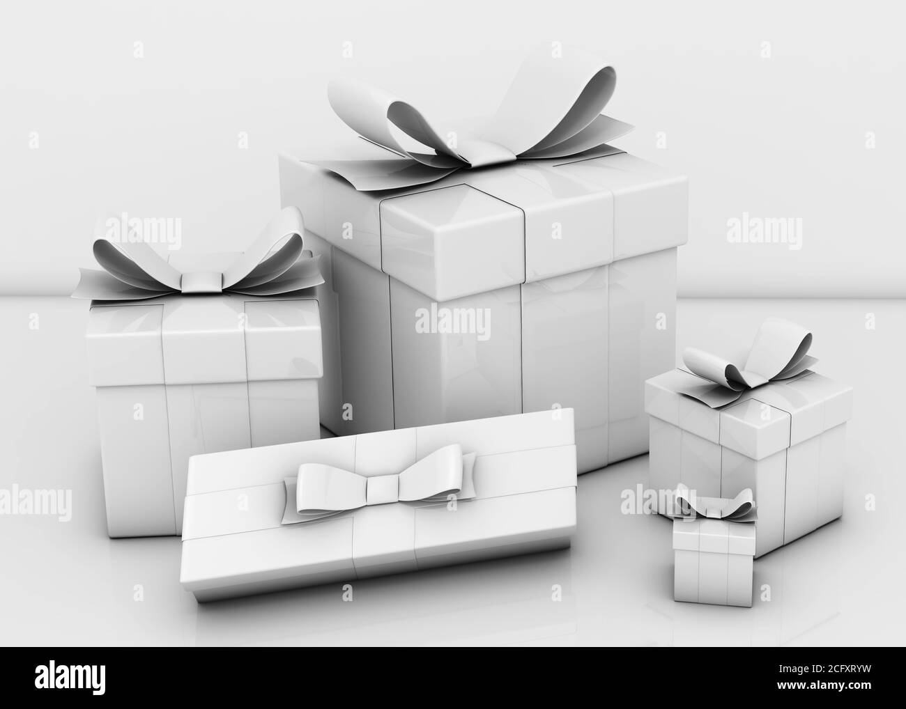 White gift boxes and empty white wall Stock Photo - Alamy