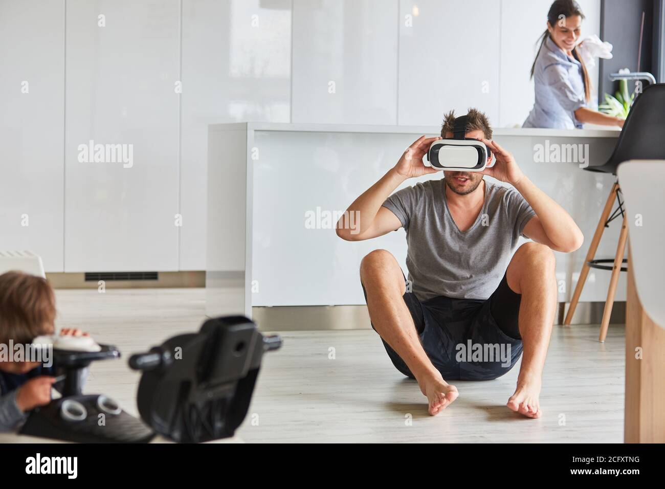 Man explores living room with VR glasses for virtual room design and ...