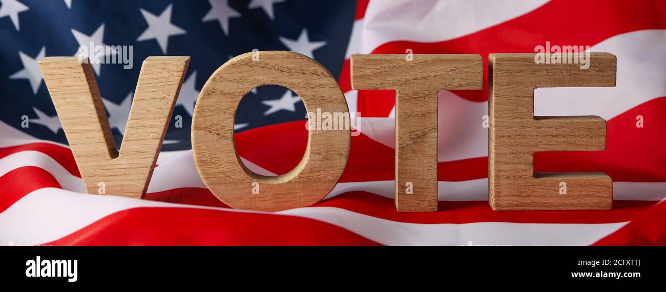 American flag with word Vote made of wooden letters Stock Photo - Alamy