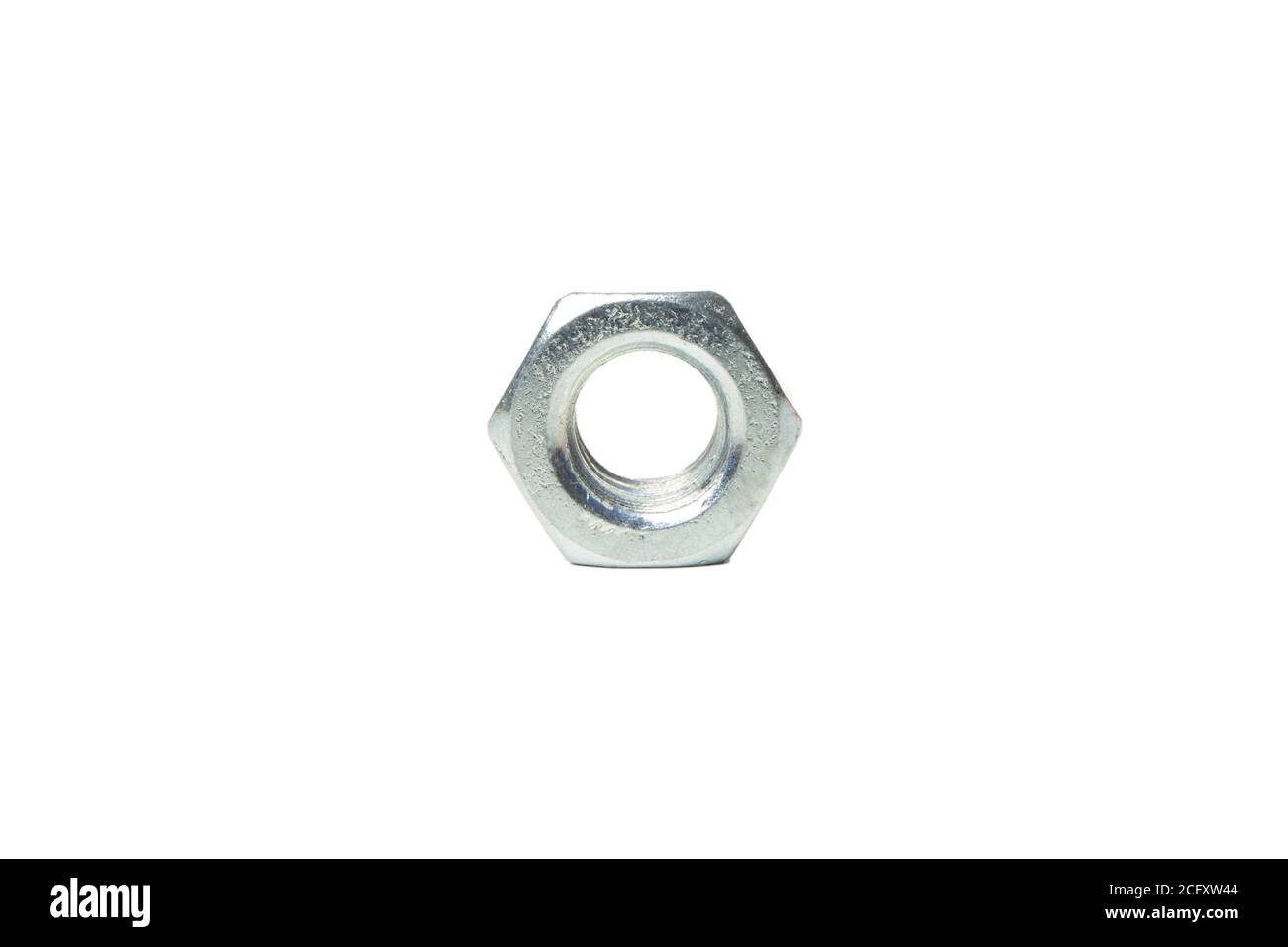 One metal nut isolated on white background Stock Photo - Alamy