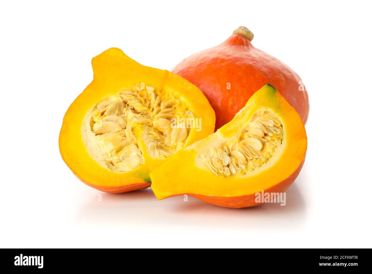 Pumpkins and slice isolated on white background Stock Photo - Alamy