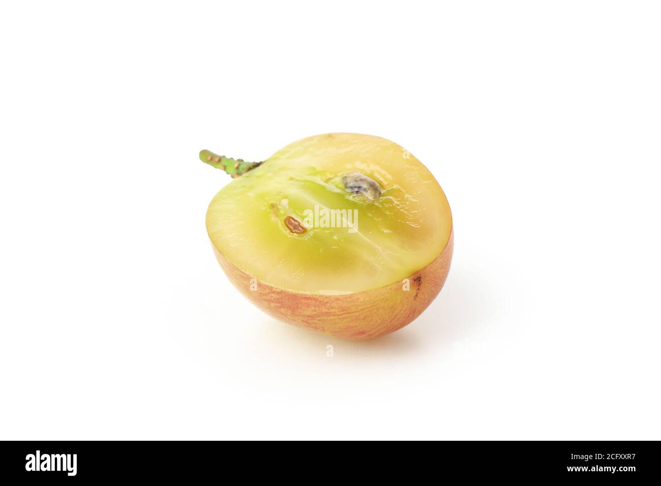Half of ripe grape isolated on white background Stock Photo - Alamy