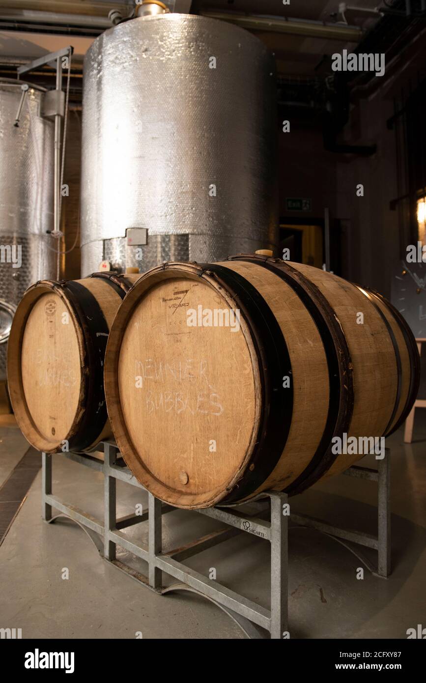 Wooden wine casks / barrels on stands in a brewery Stock Photo - Alamy