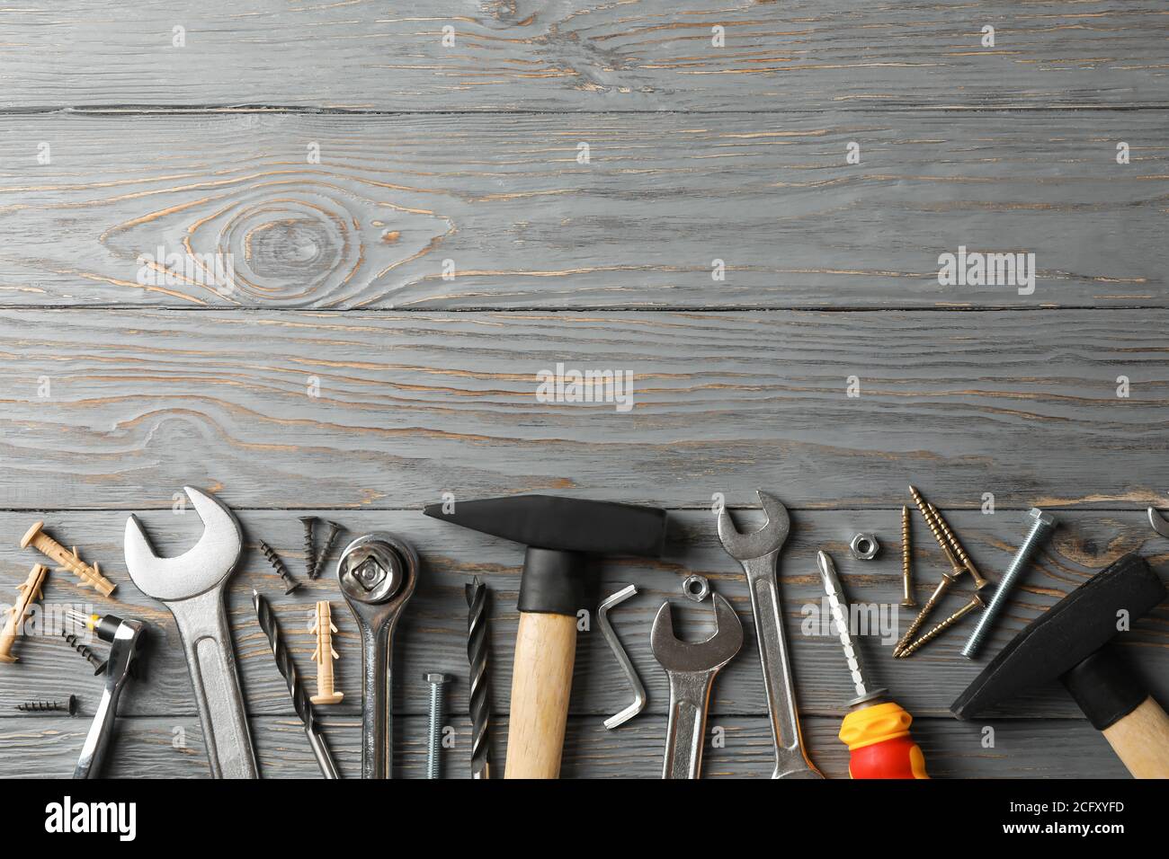 Construction tools on table, space for text Stock Photo - Alamy