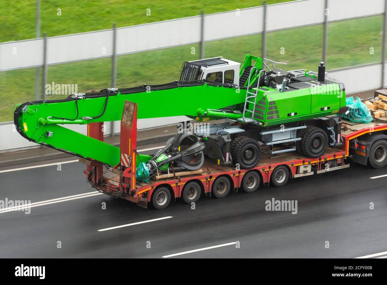 Heavy new green technics long boom claws for gripping scrap metal on ...