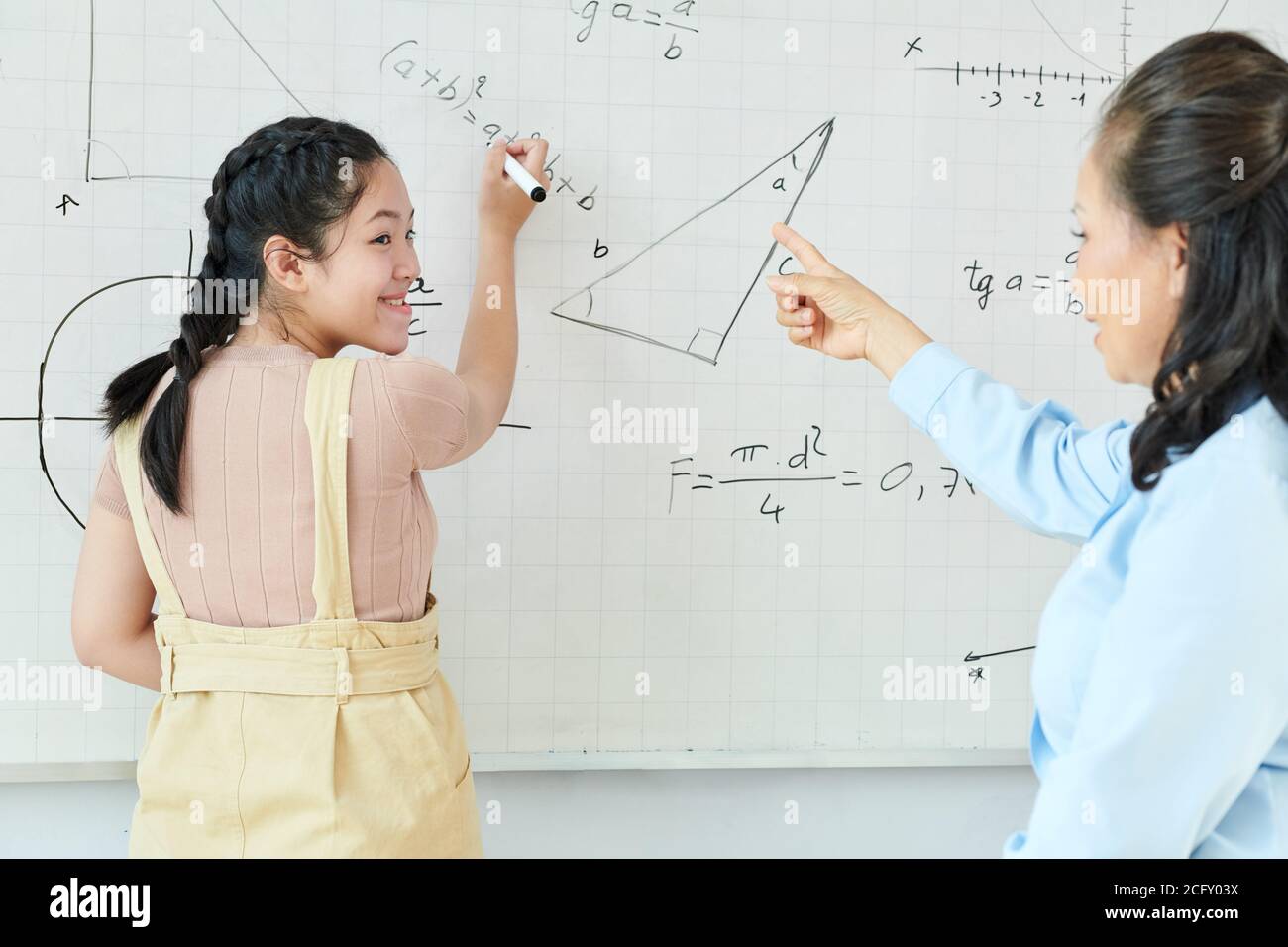 Child whiteboard math hi-res stock photography and images - Alamy
