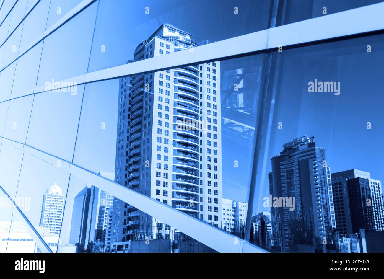 Buildings reflected in windows of modern office building Stock Photo ...