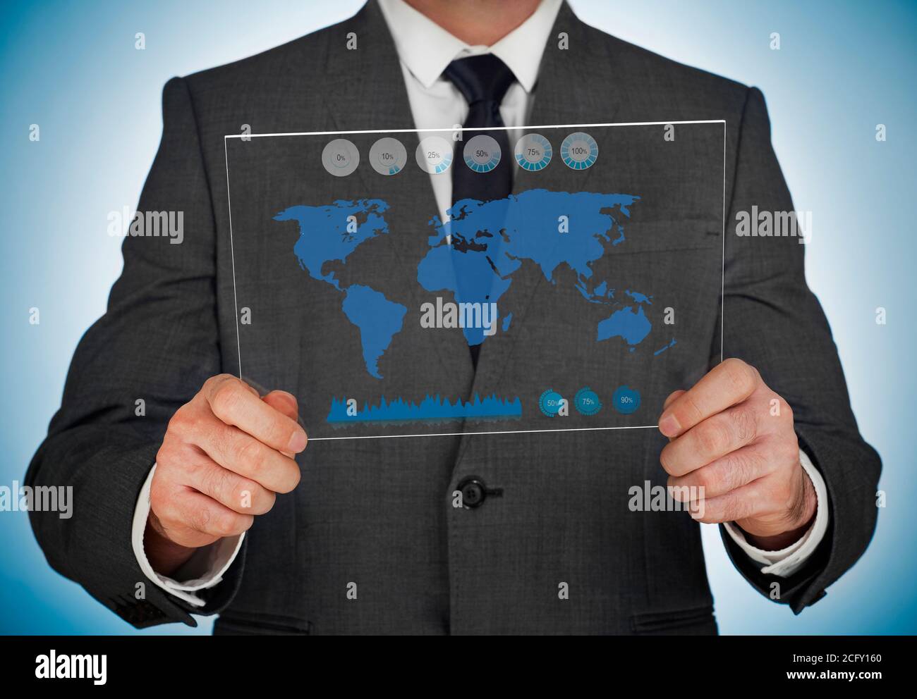 Businessman looking at world map on a glass screen Stock Photo - Alamy