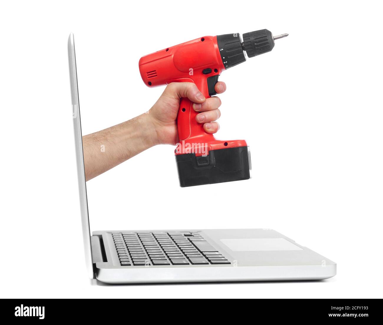 Hand with drill out of laptop Stock Photo - Alamy