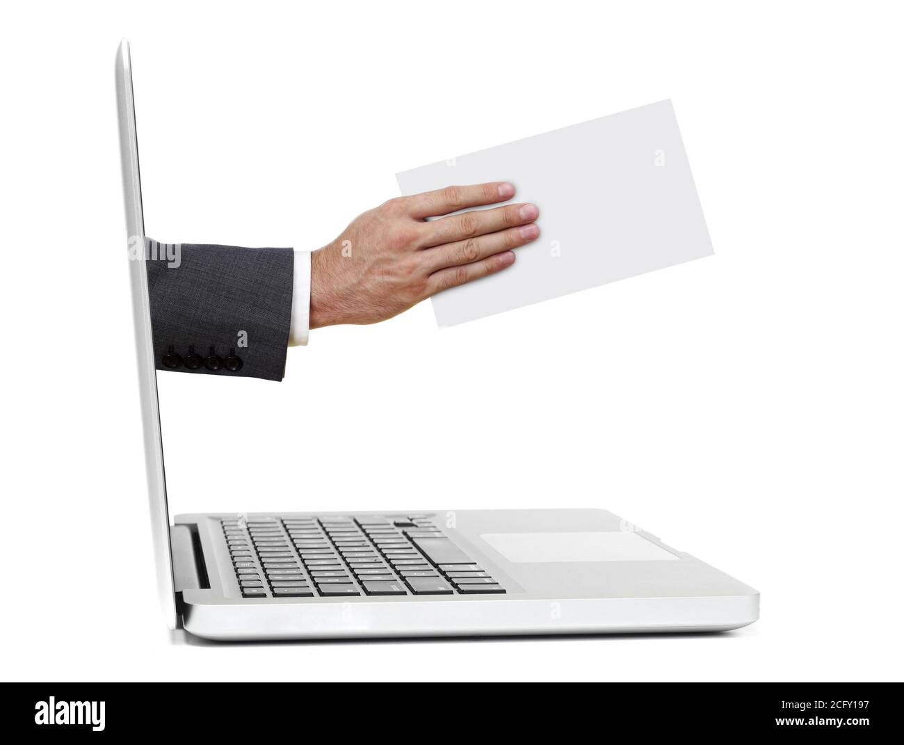 Hand with paper out of laptop Stock Photo - Alamy