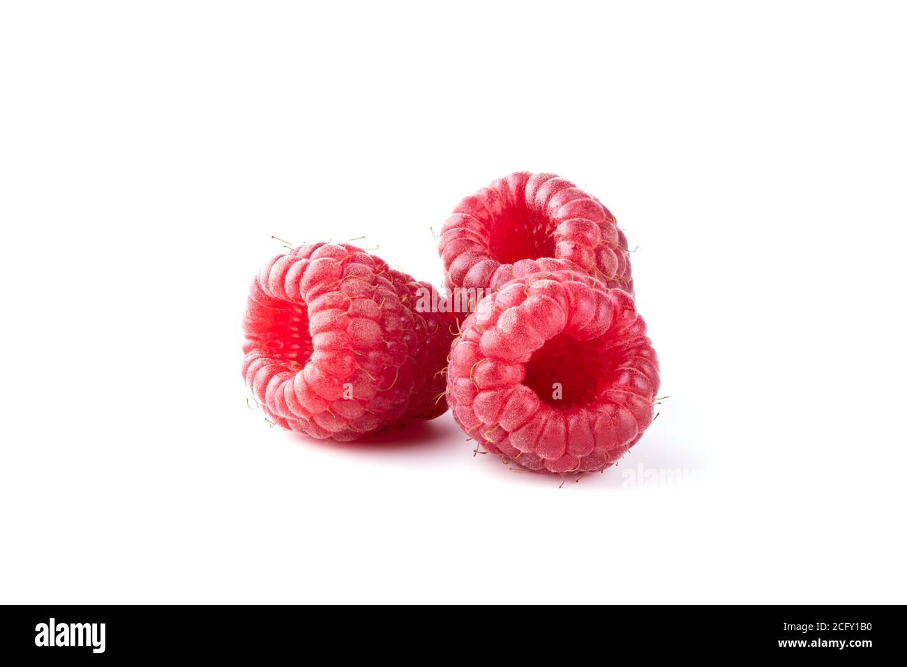 Three ripe raspberry fruits isolated on white background Stock Photo ...