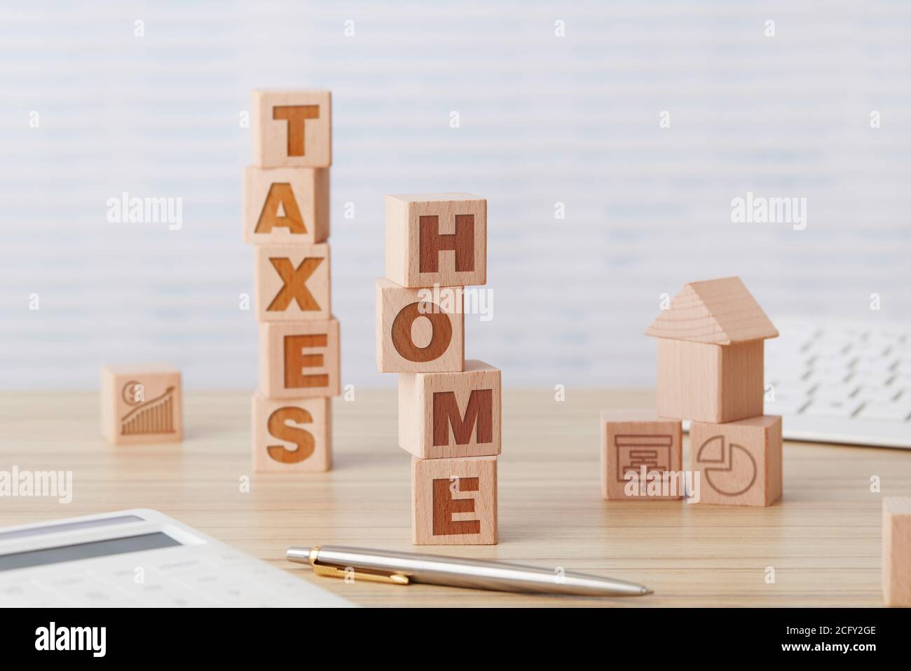 Home taxes wooden blocks on desk Stock Photo - Alamy
