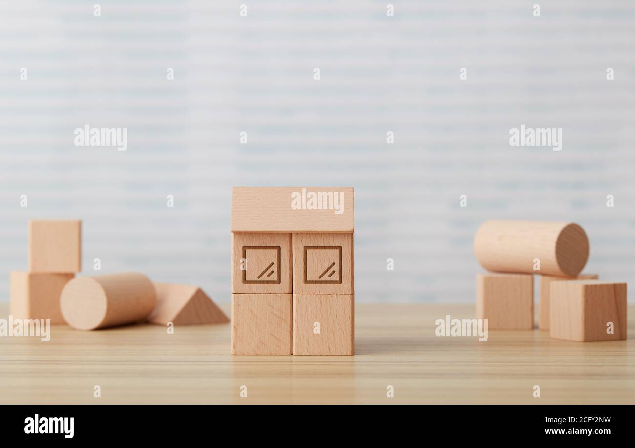 Wooden cubes on office desk Stock Photo - Alamy