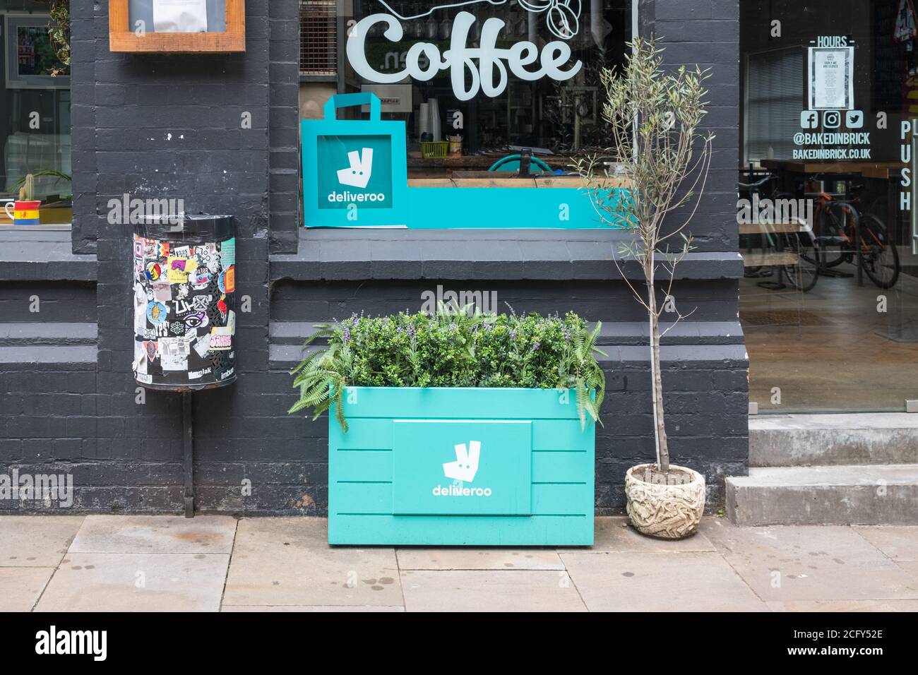 Deliveroo sign painted on plant pot planter in the Custard Factory in ...