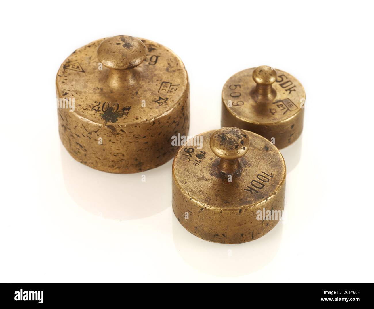 Old weights isolated on white Stock Photo - Alamy