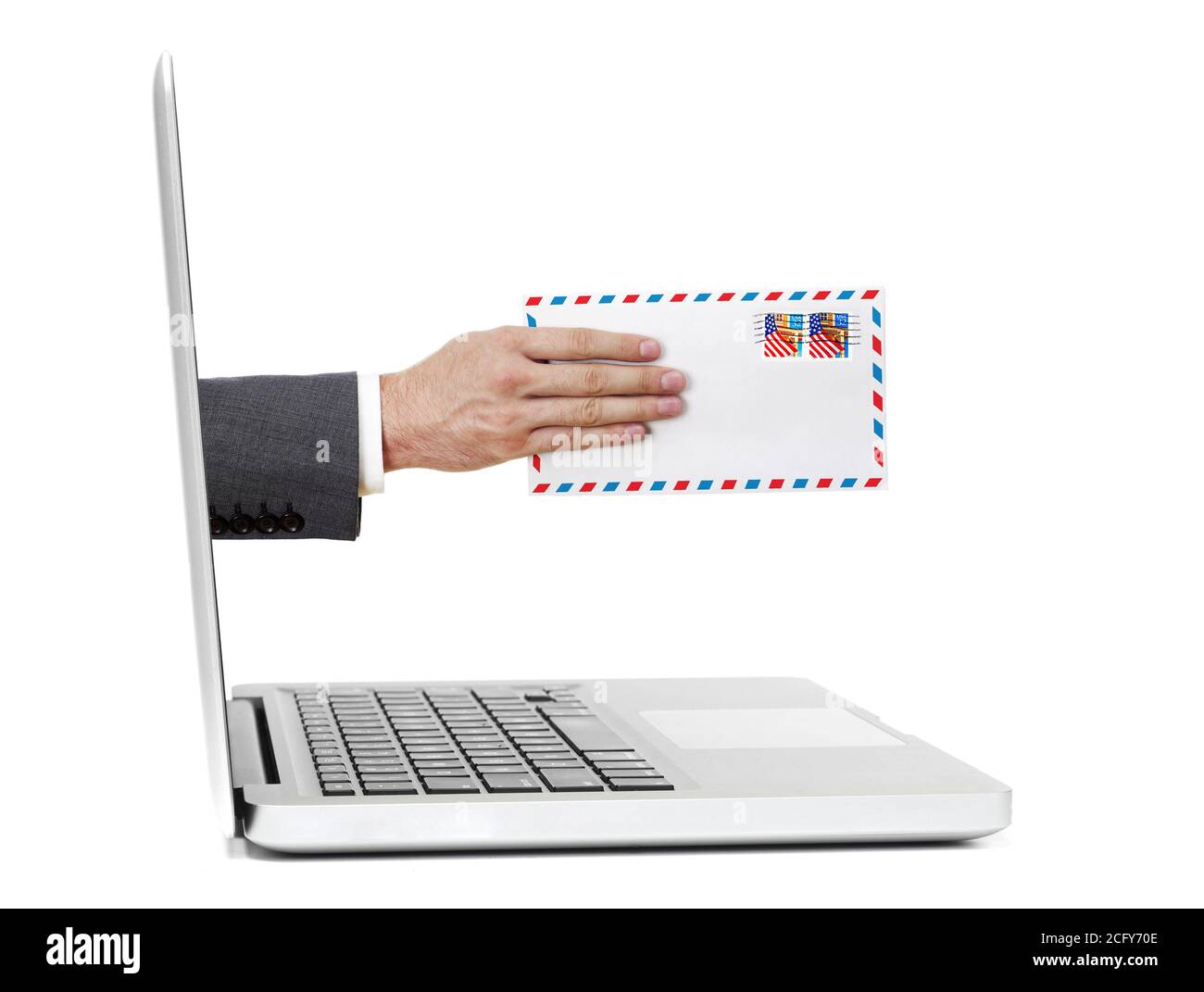 Hand with mail out of laptop Stock Photo - Alamy
