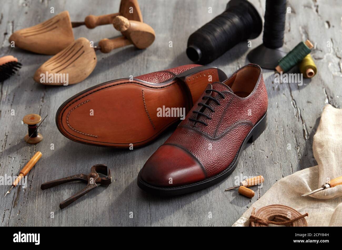 Dress shoe and vintage craft tools Stock Photo - Alamy