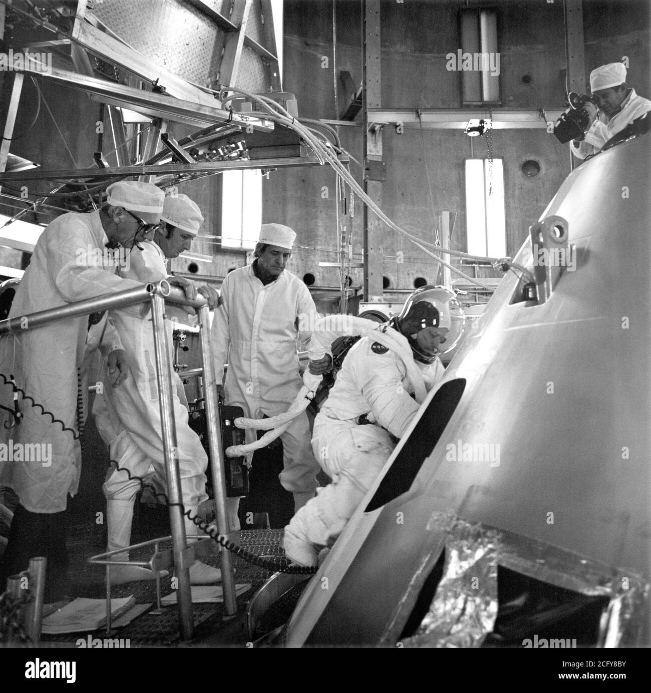 Skylab 4 Commander Gerald P. Carr is fully suited as he prepares to ...