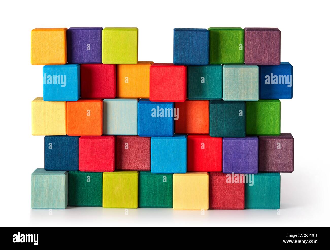 Wooden toy blocks on white background Stock Photo - Alamy