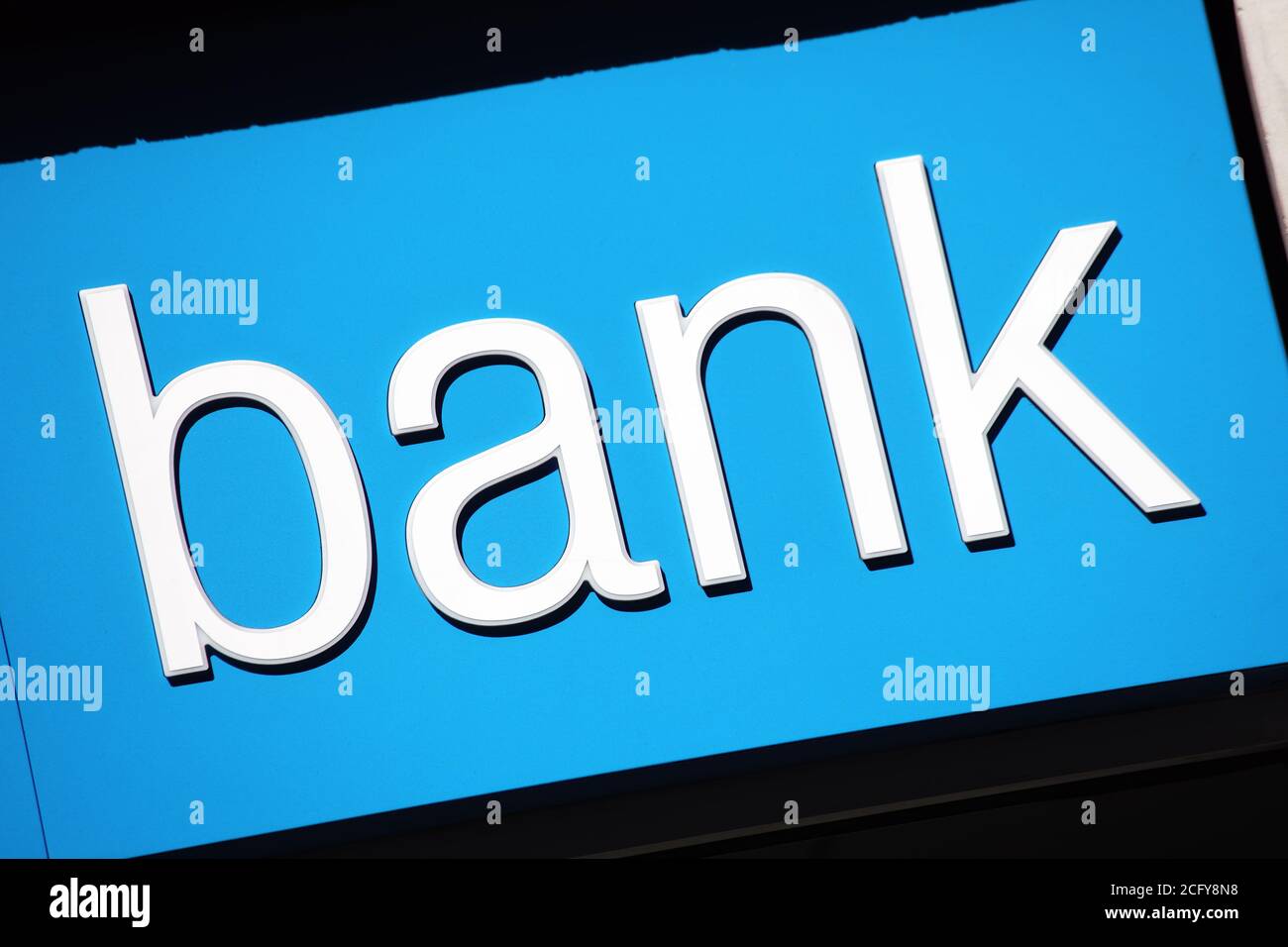 Modern bank sign above its financial business building banking entrance ...