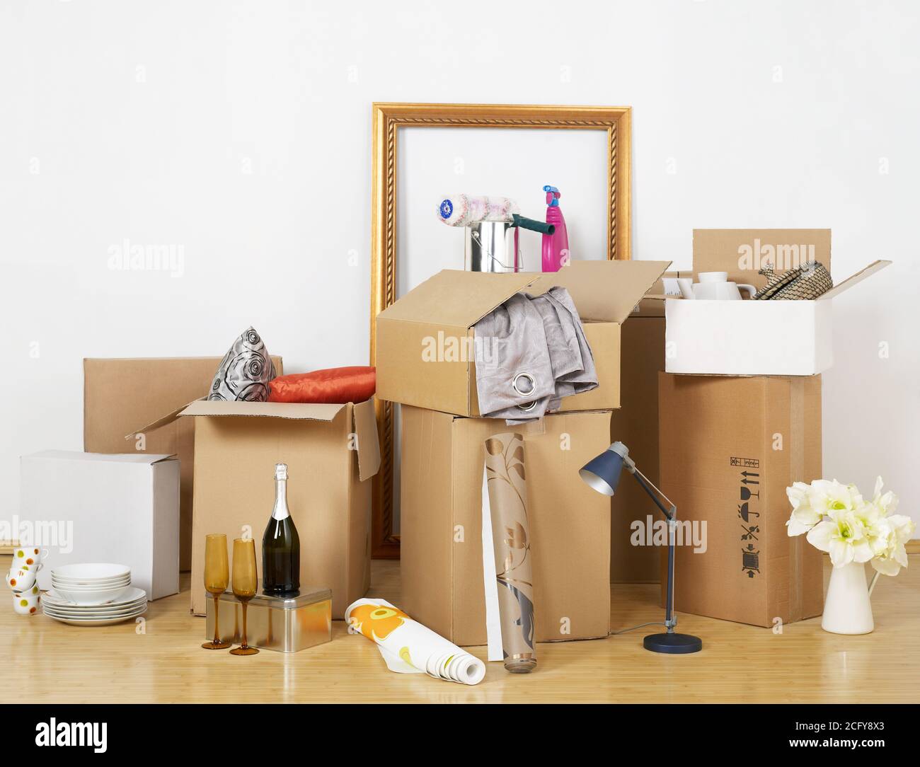 Moving boxes and house objects Stock Photo - Alamy