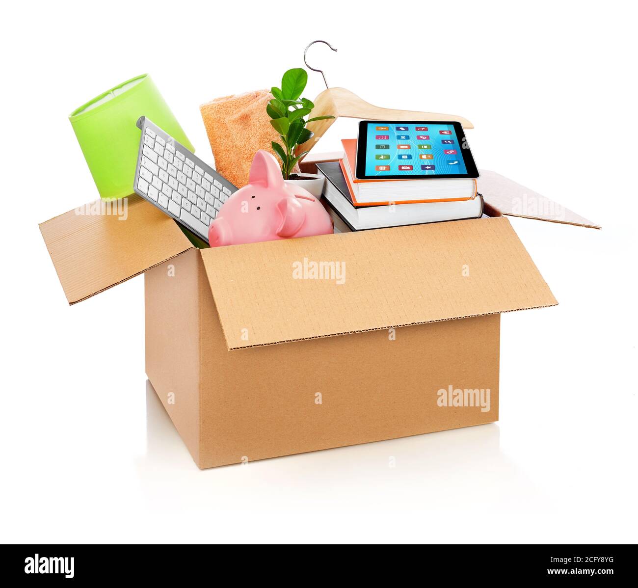 Cardboard box full with household stuff Stock Photo - Alamy
