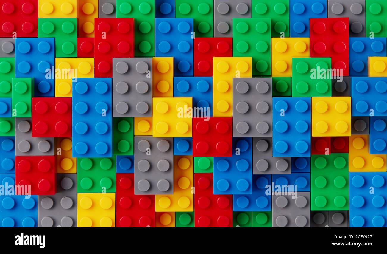 Multi-colored plastic block background Stock Photo - Alamy