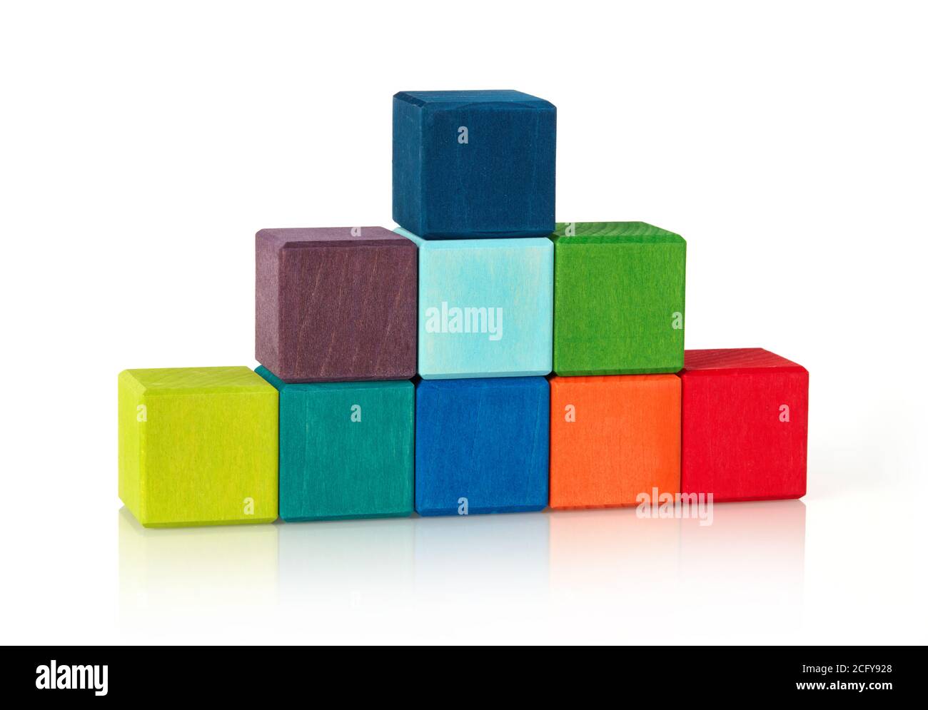 Wooden toy blocks on white background Stock Photo - Alamy