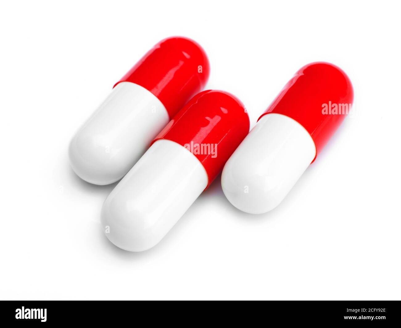 Red and white capsules Stock Photo - Alamy