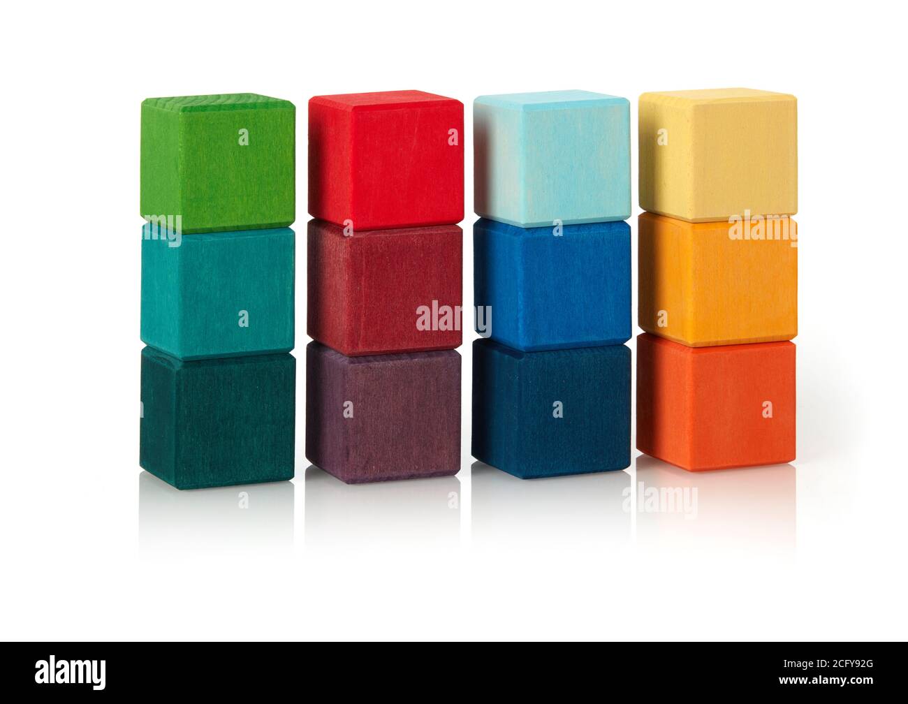 Wooden toy blocks on white background Stock Photo - Alamy