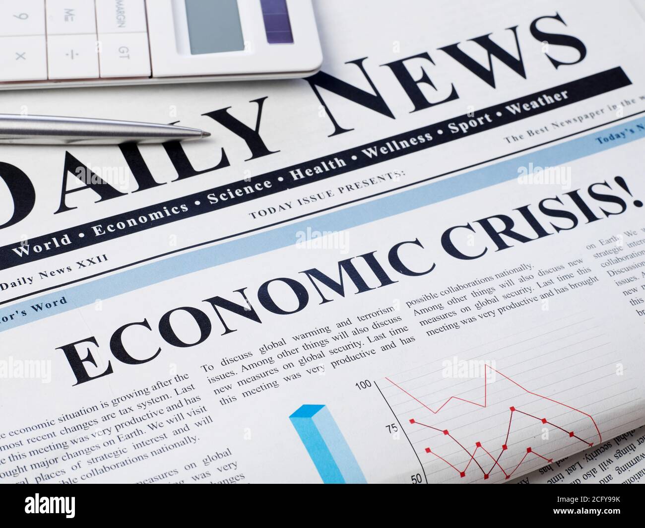 Economic crisis headline on newspaper Stock Photo - Alamy