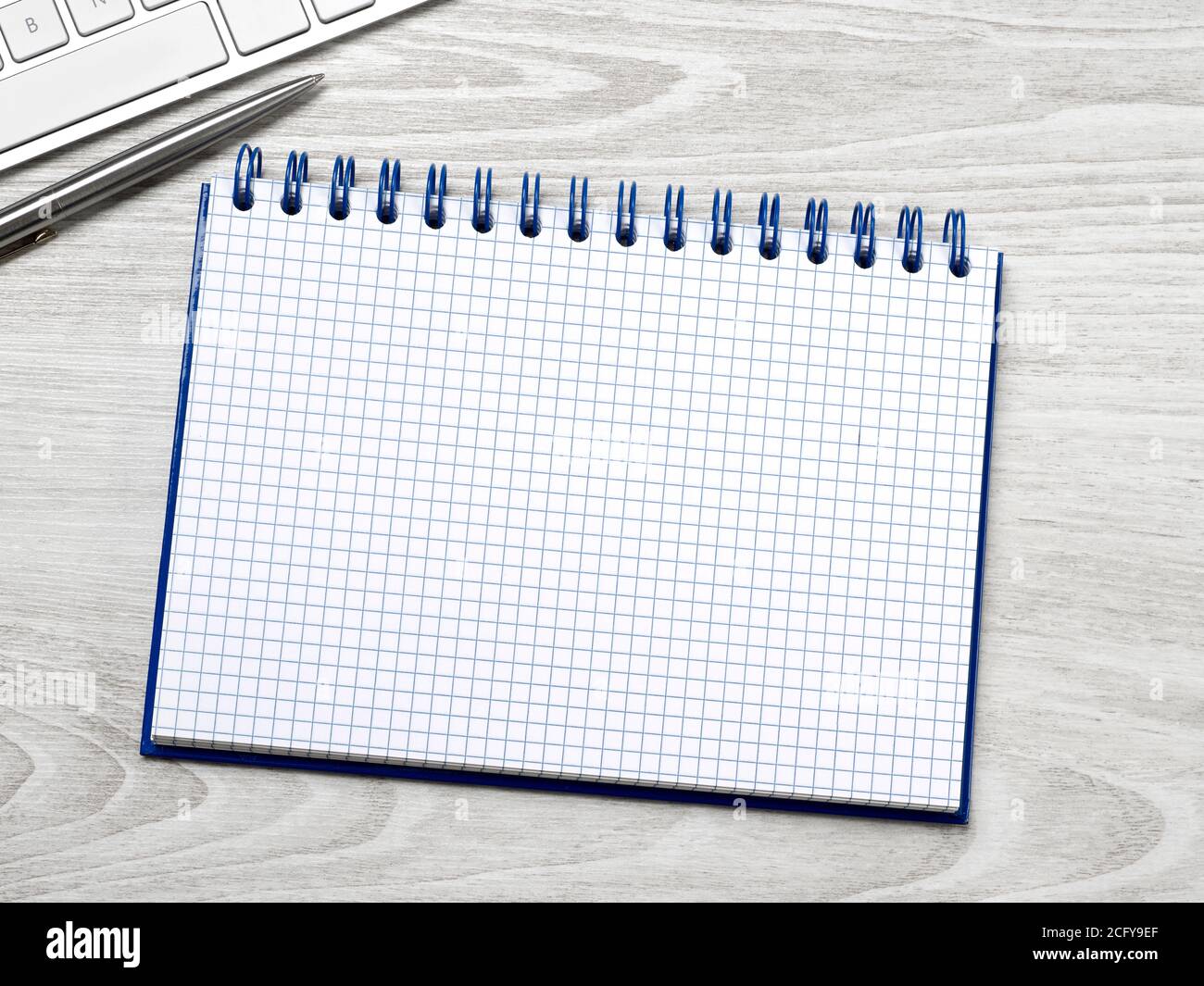 Blank notebook on desk Stock Photo - Alamy