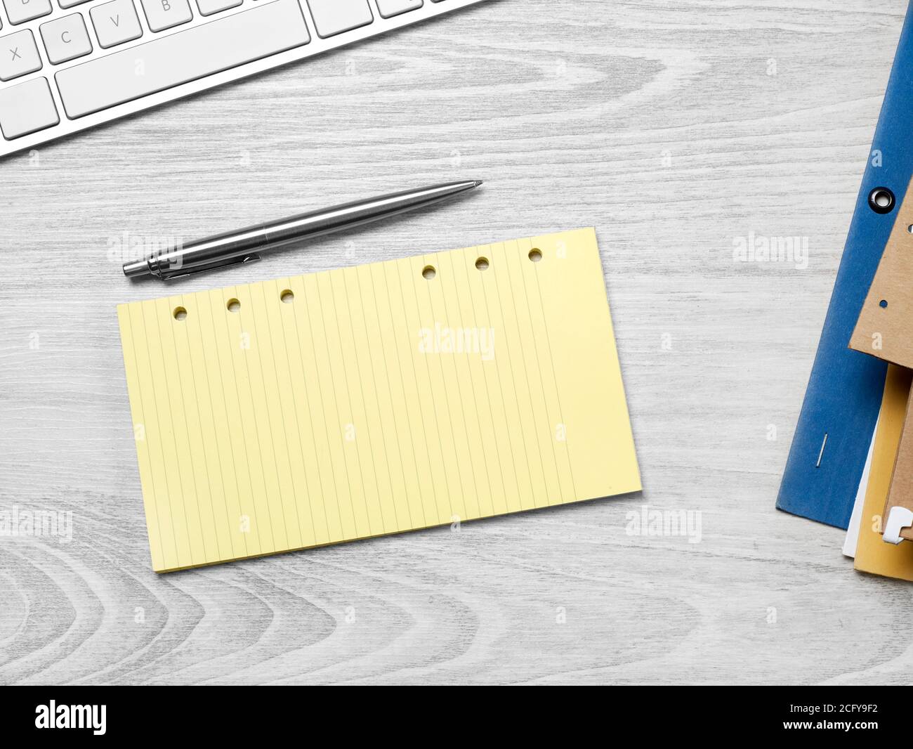 Blank notebook on desk Stock Photo - Alamy