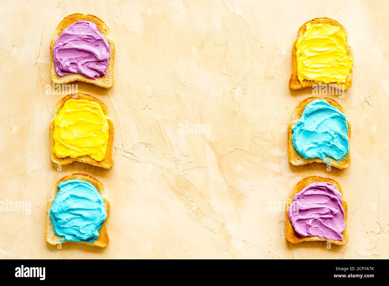 Unicorn colored toast bread slices. Food background, top view Stock ...