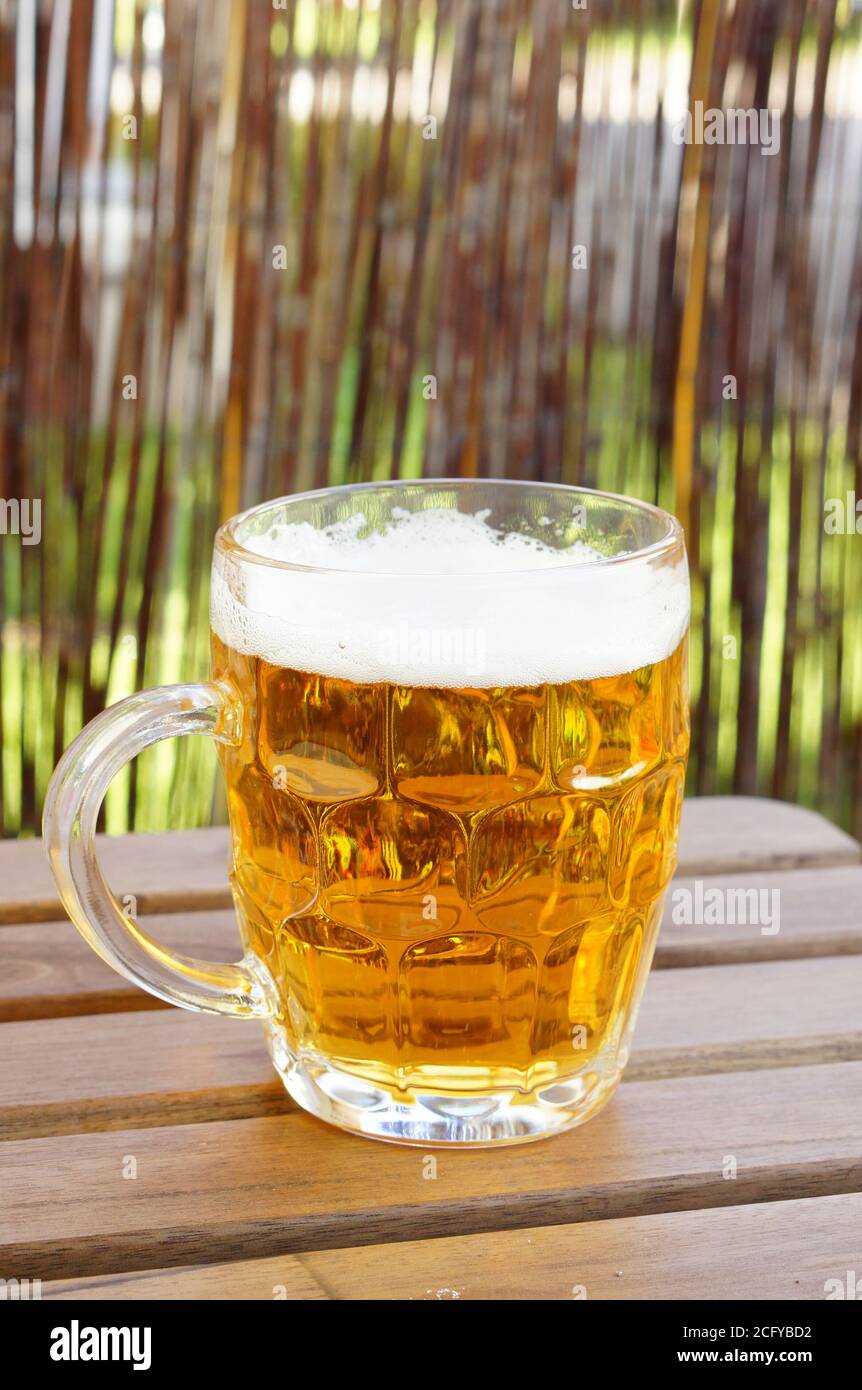 Fresh bier in a large glass Stock Photo - Alamy