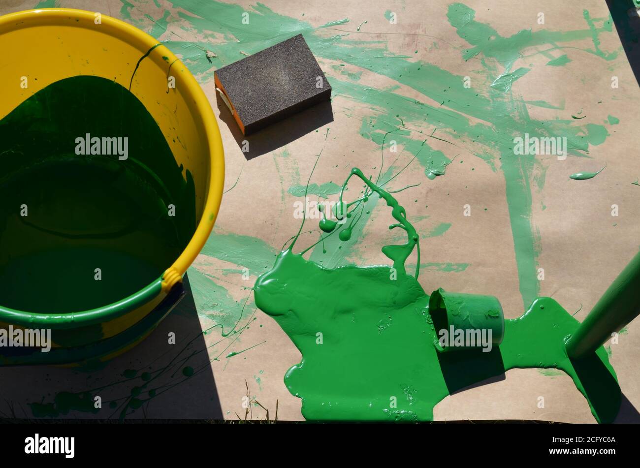 DIY painting with green oil paint. Renovation concept Stock Photo - Alamy