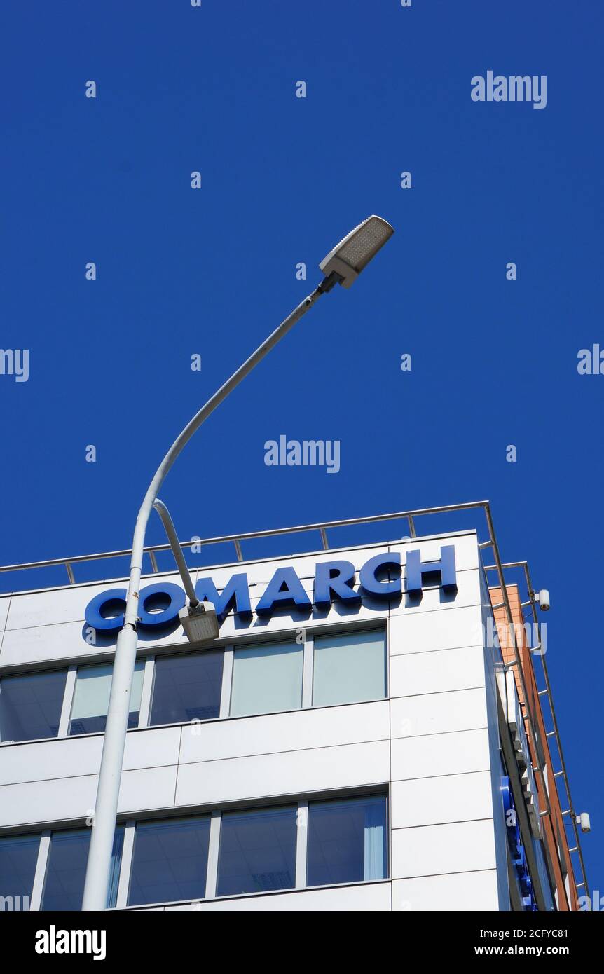 POZNAN, POLAND - Aug 26, 2016: Top of a modern office building with ...